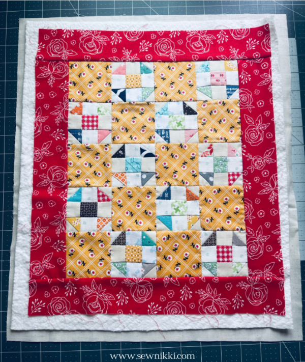 How to Bind a Quilt - Easy Single Fold Binding - Sew Nikki
